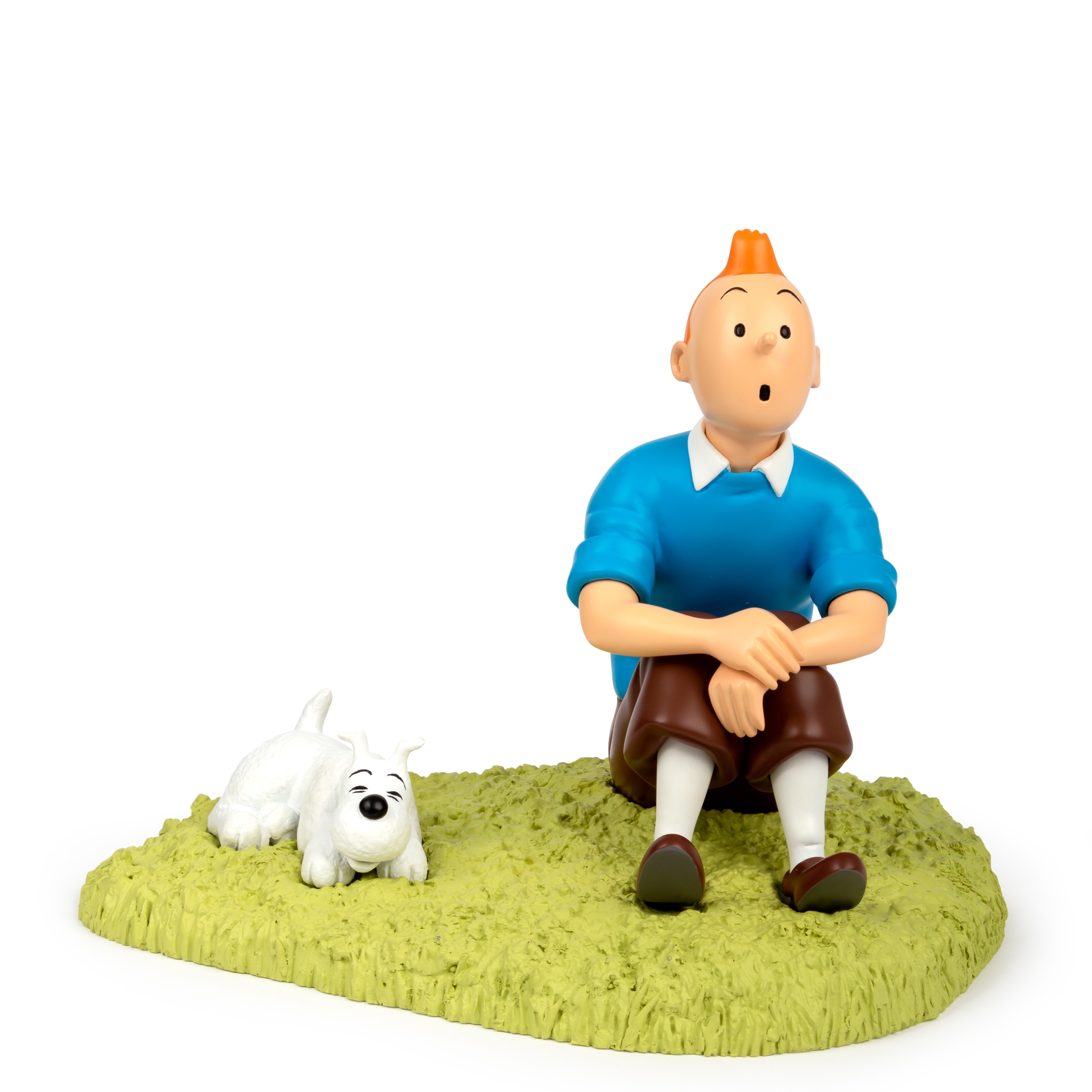 Tintin sitting on the grass - Accueil | BOUTIQUE.TINTIN.COM Tintin ...